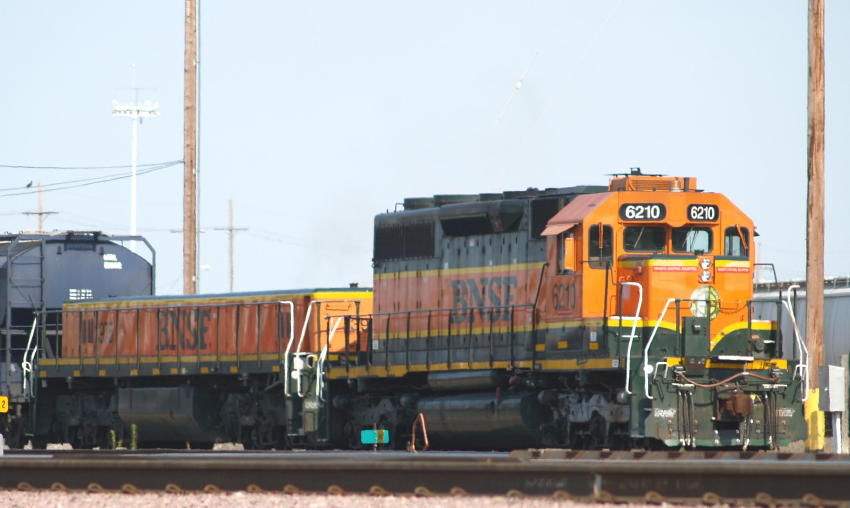 BNSF unit #6210 & slug #3975 sit and wait.: The GreatRails North American Railroad Photo Archive