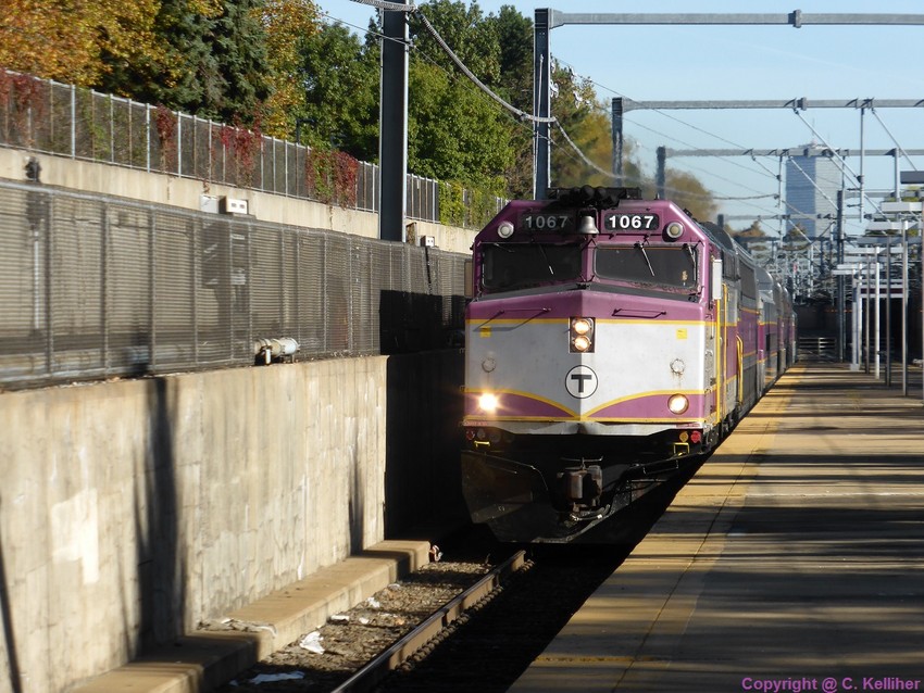 MBTA 1067 leads a train to Needham Heights: The GreatRails North American Railroad Photo Archive